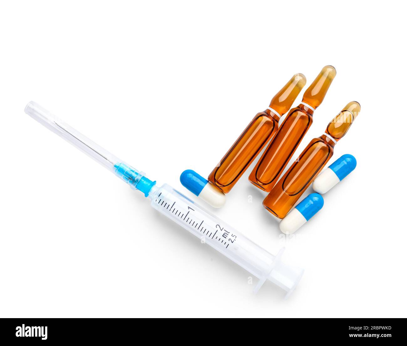 Ampules, pills and syringe with needle on white background Stock Photo ...