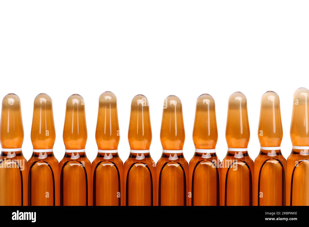 Many ampules on white background Stock Photo - Alamy