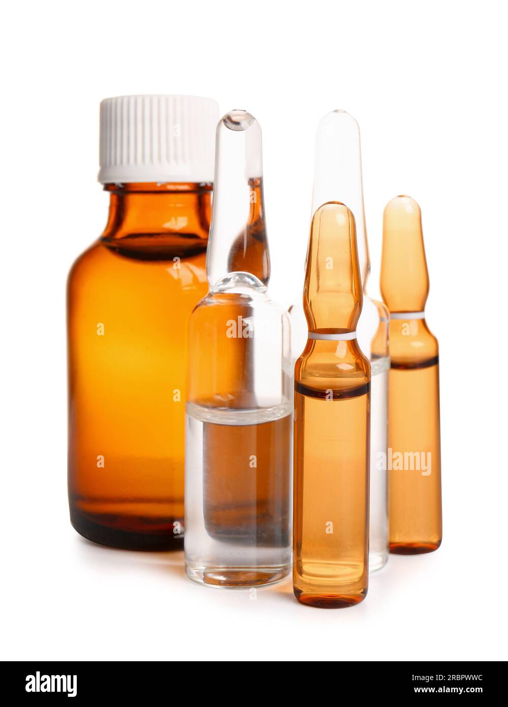 Ampules and bottle with medicines on white background Stock Photo - Alamy