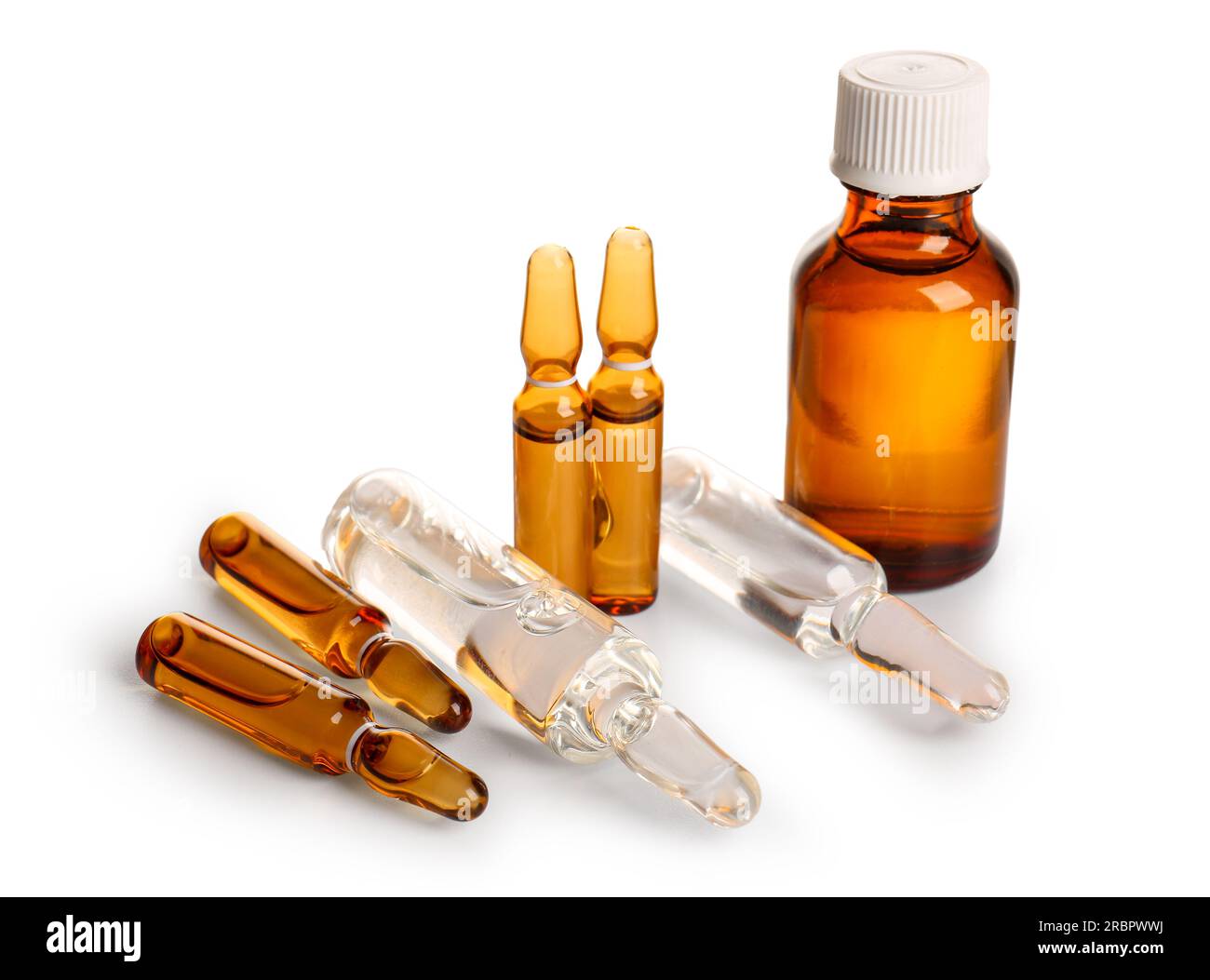 Ampules and bottle with medicines on white background Stock Photo - Alamy