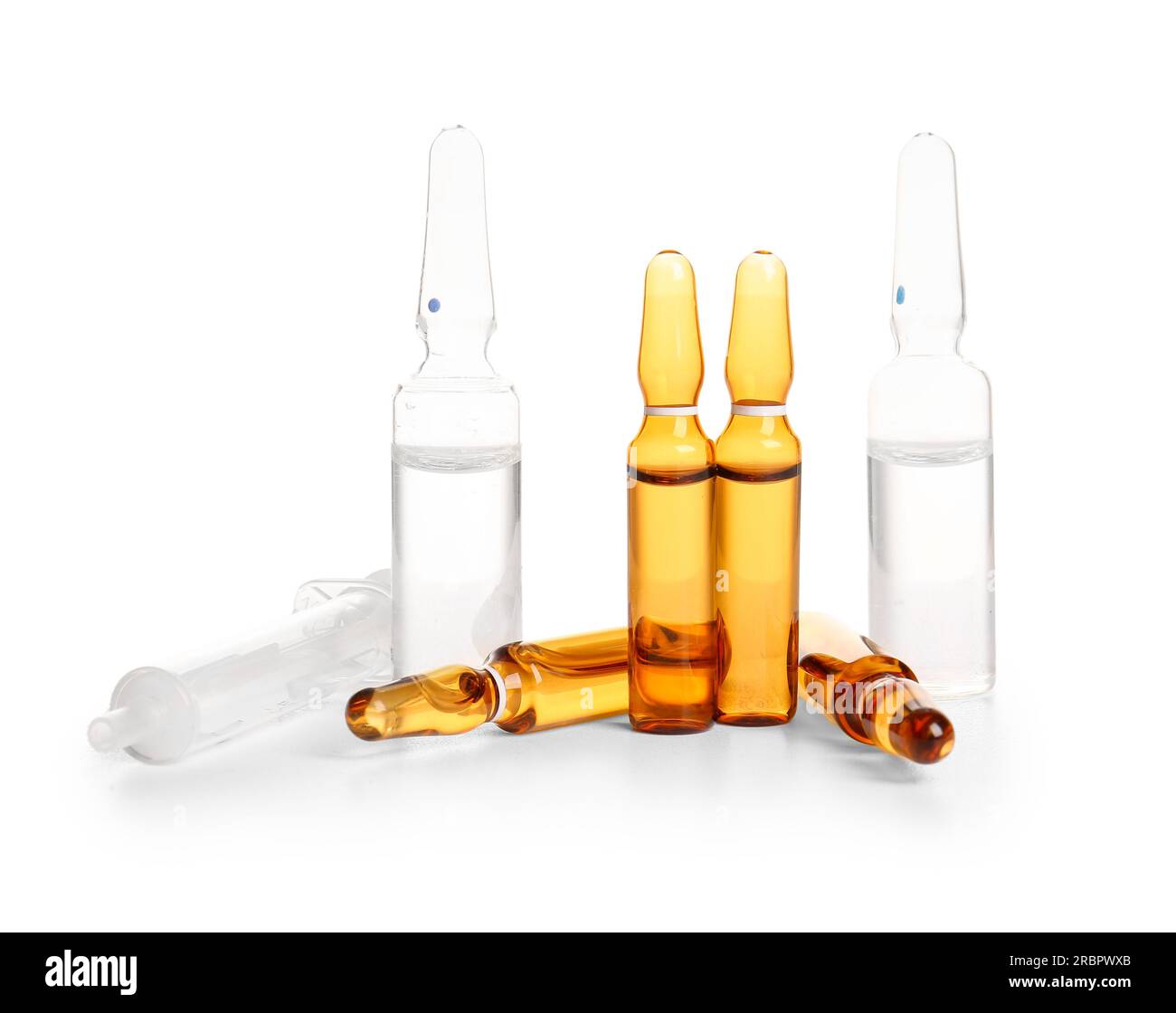 Ampules with syringe on white background Stock Photo - Alamy