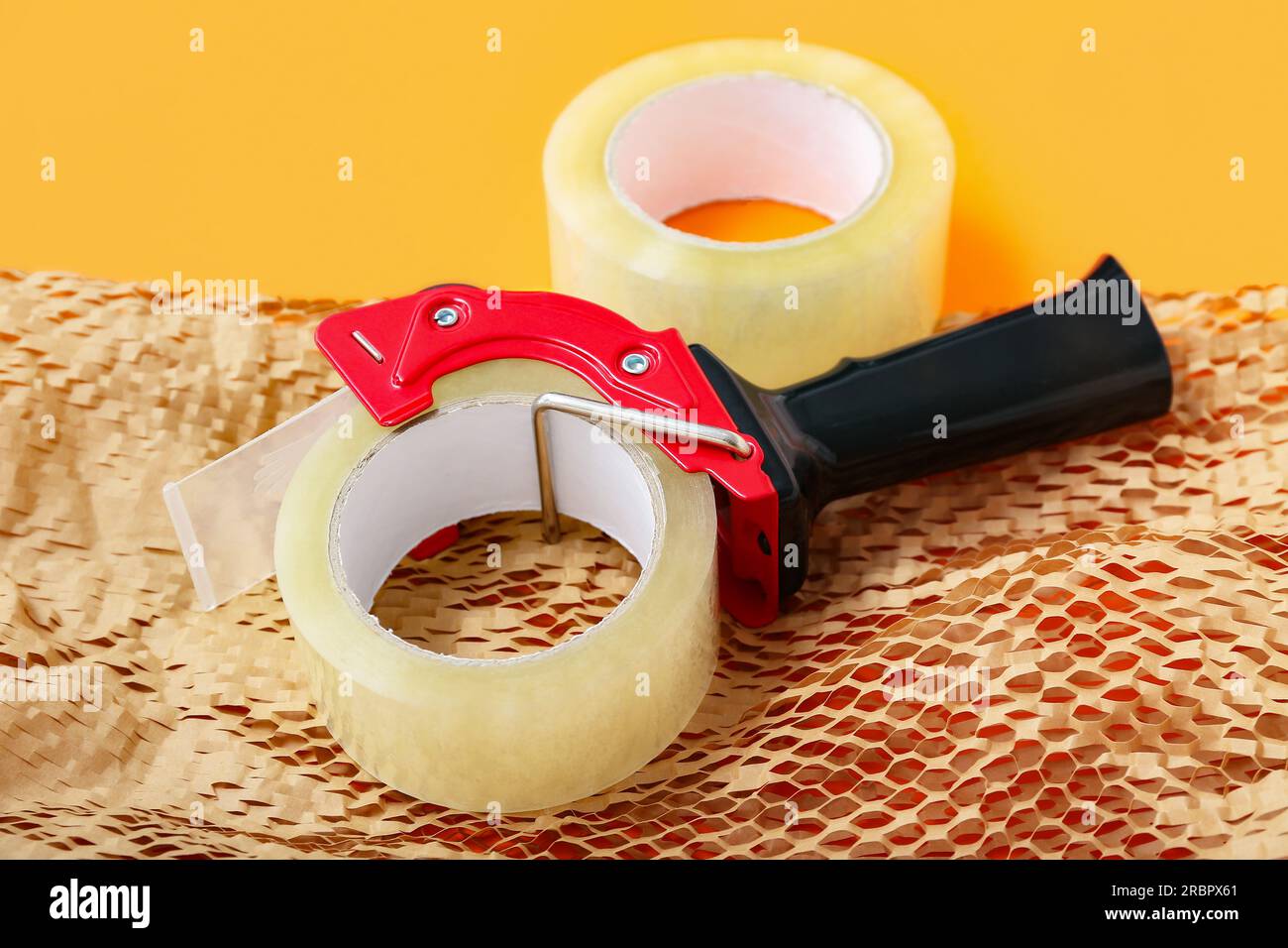 Orange packing tape dispenser adhesive hi-res stock photography and ...
