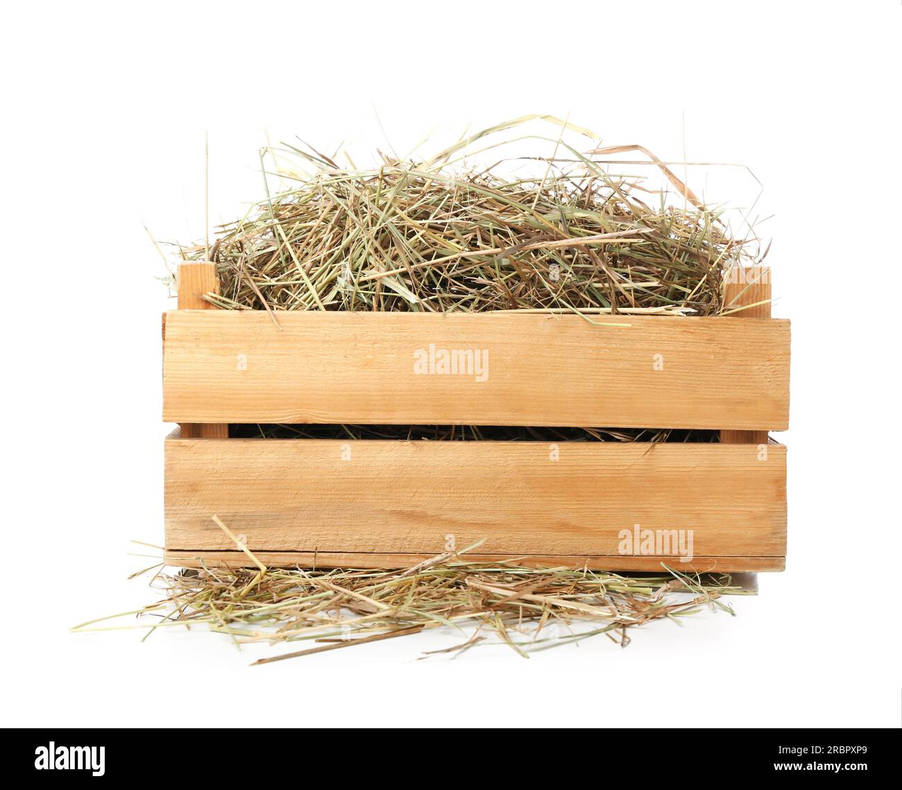 Straw in crate on white background Stock Photo - Alamy