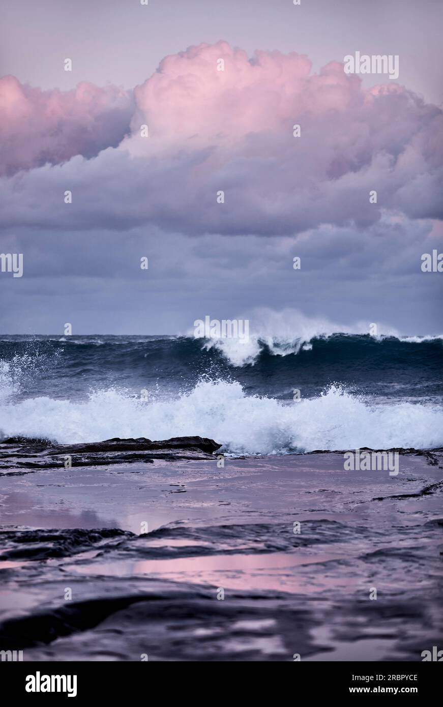 Waves crashing during a winter sunset at Dee Why Beach, Northern ...