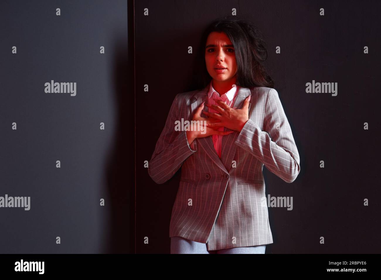 Female office worker having panic attack indoors Stock Photo - Alamy