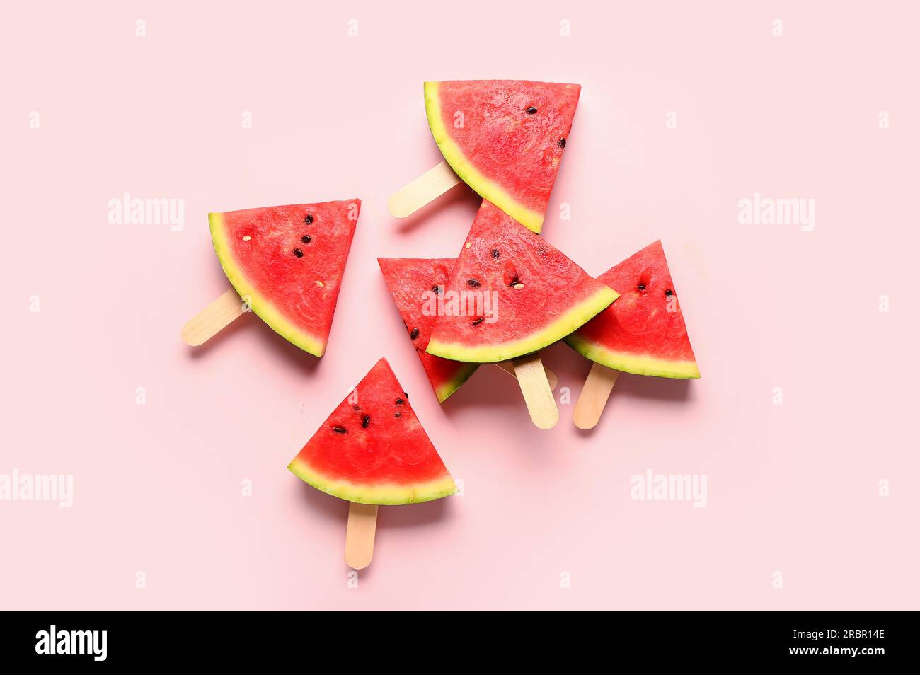 Sweet watermelon sticks on pink background Stock Photo - Alamy