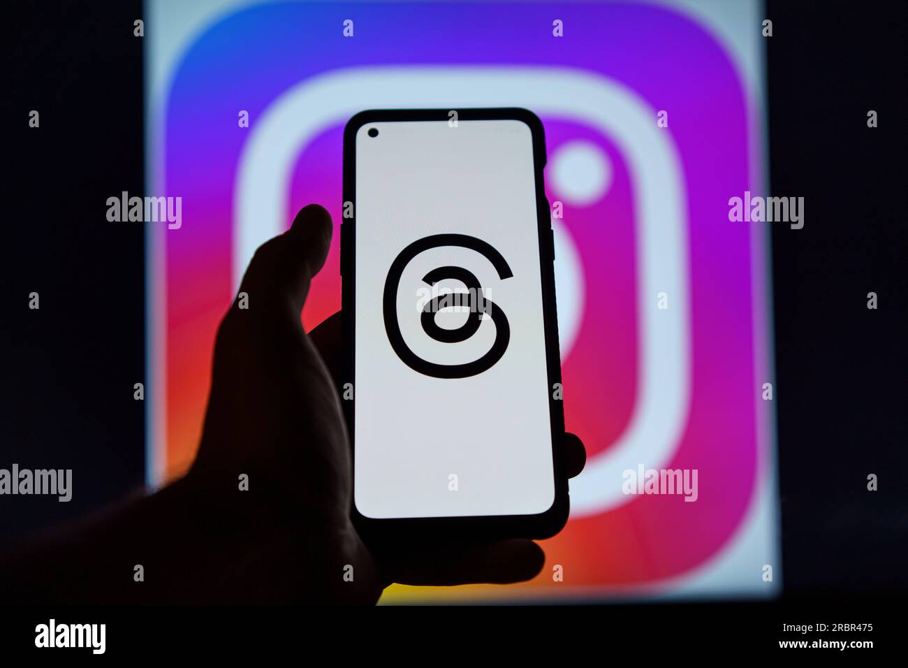 Threads an instagram app logo on mobile phone screen Stock Photo - Alamy