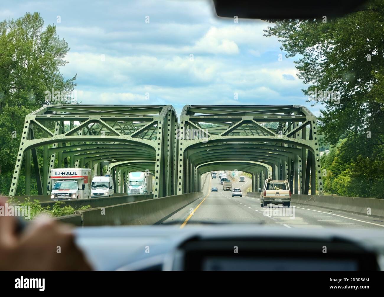 Traffic with steel warren type truss bridges on Interstate 5 North ...