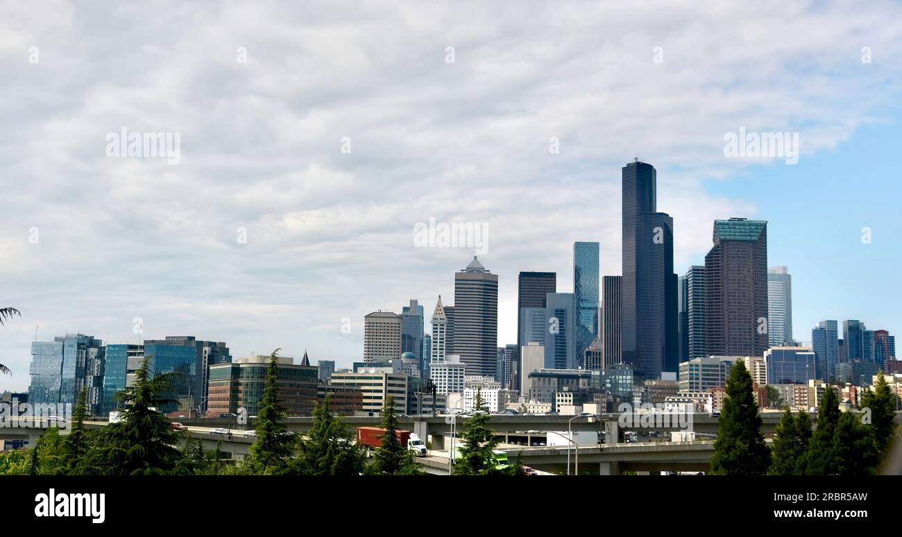 View of the city skyline from inside a car driving north on Interstate ...
