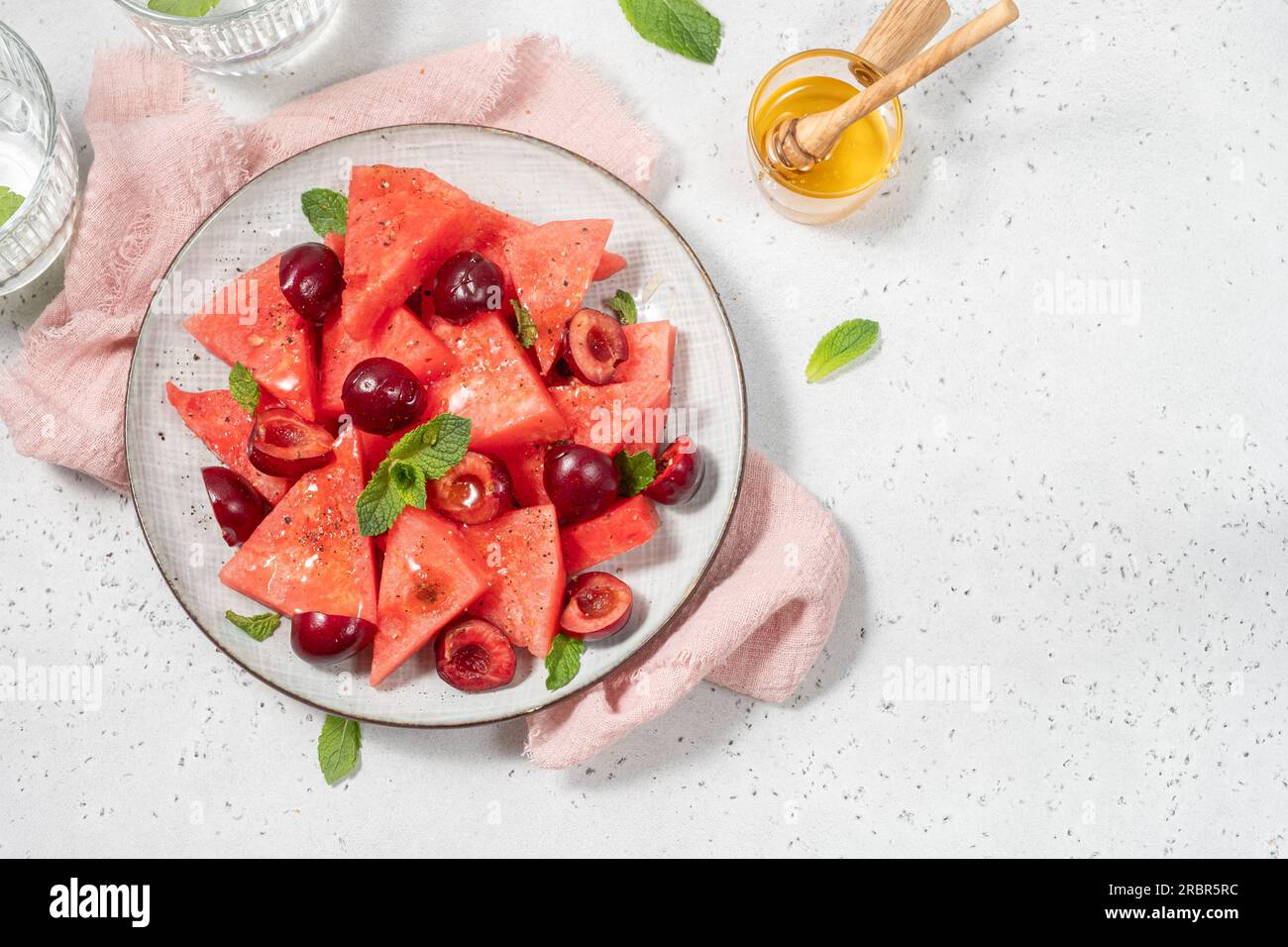 A fresh fruit salad made from cherries and watermelon Stock Photo - Alamy