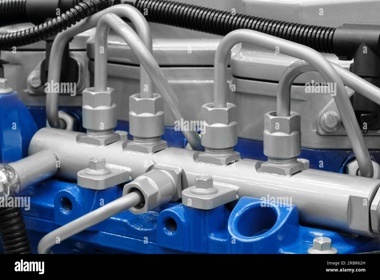 Blue diesel engine. Fragment of a diesel motor close-up. Selective on ...