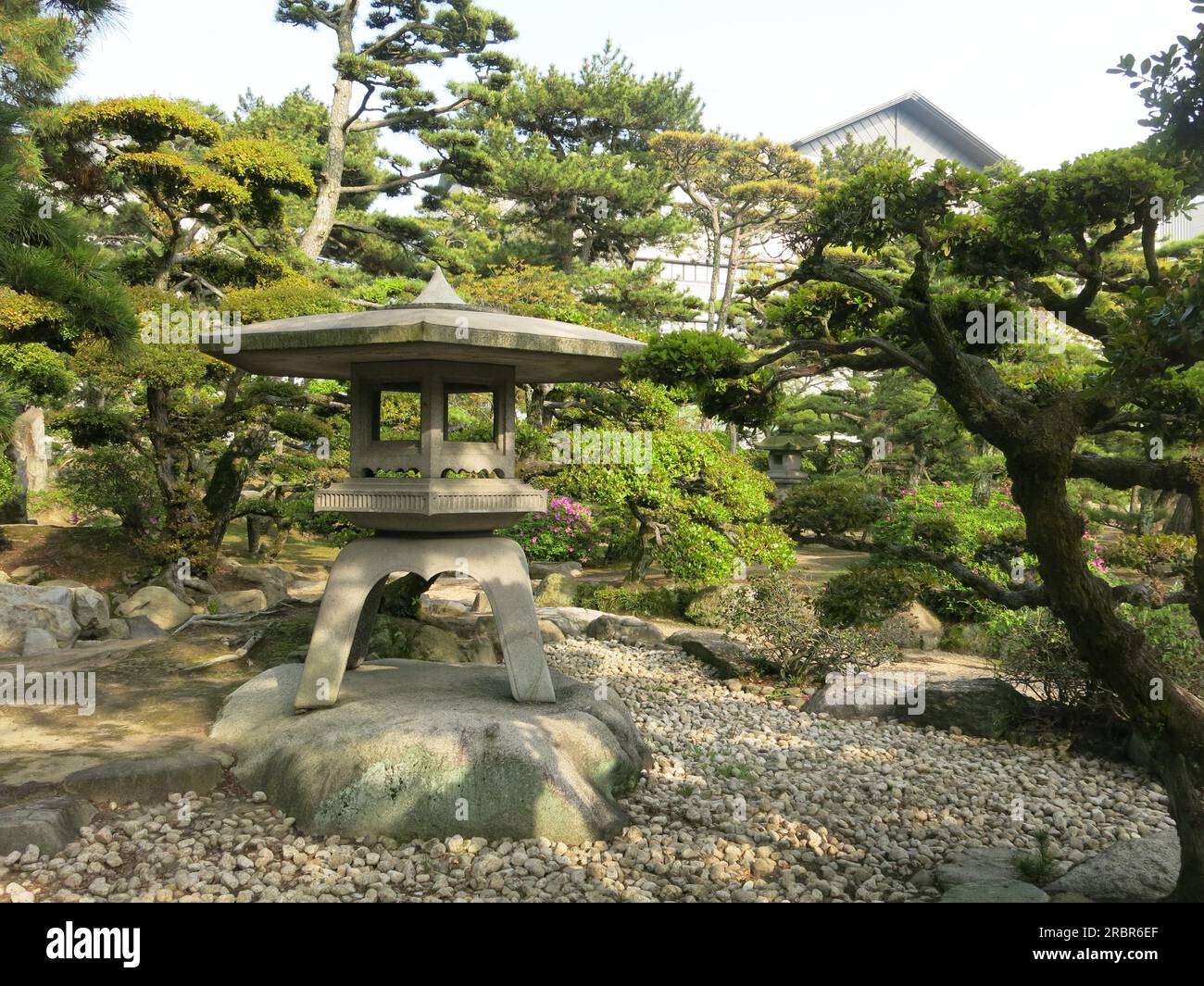 Elements of the Japanese Garden: a stone lantern, carefully placed ...