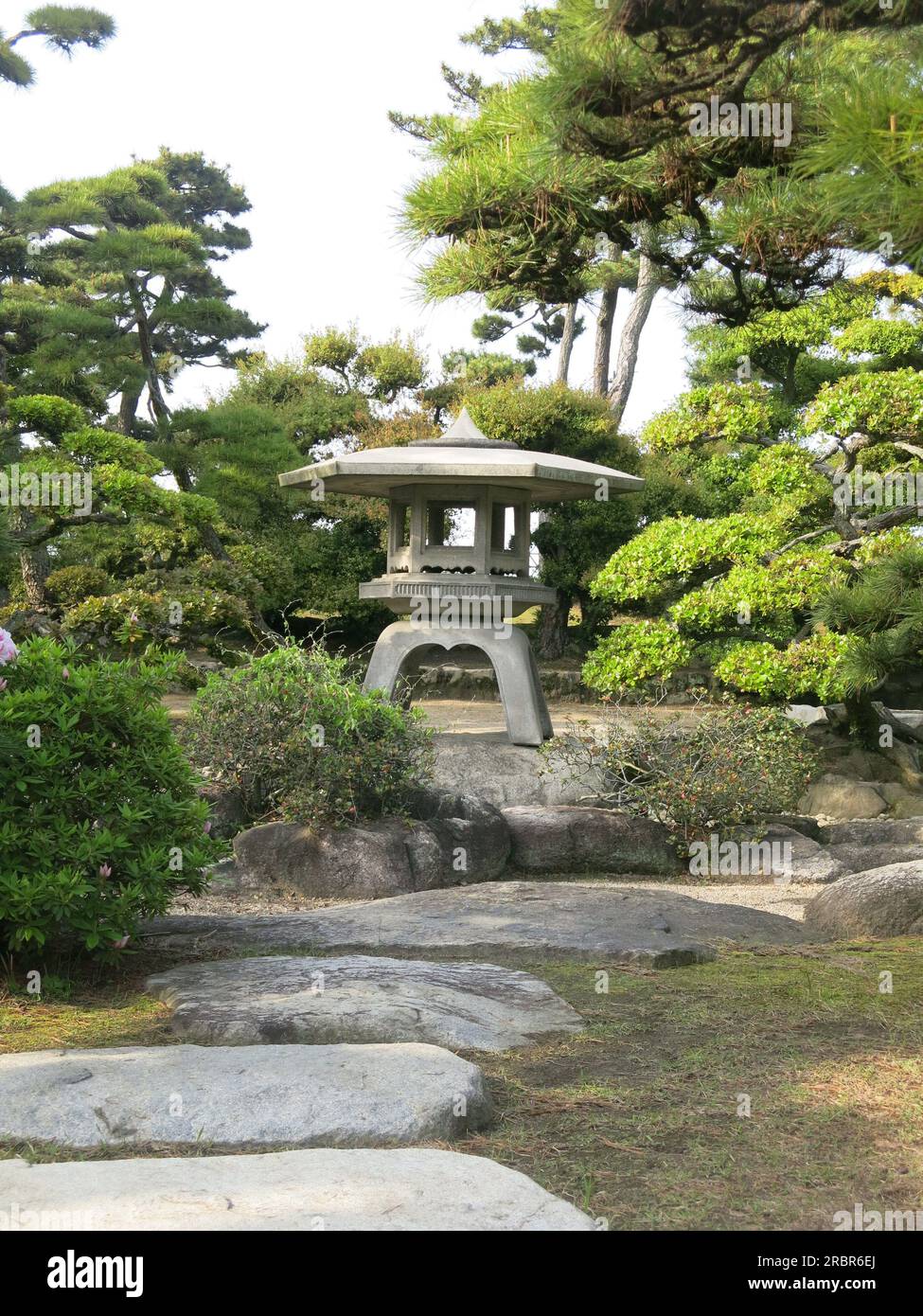 Elements of the Japanese Garden: a stone lantern, carefully placed ...