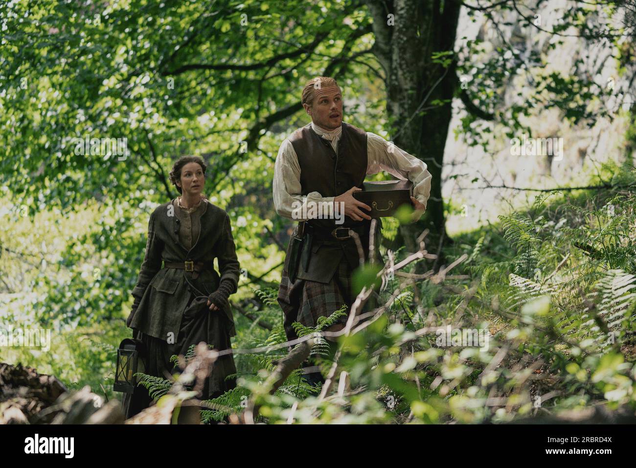 OUTLANDER, from left: Caitriona Balfe, Sam Heughan, 'Death Be Not Proud', (Season 7, ep. 703 ...