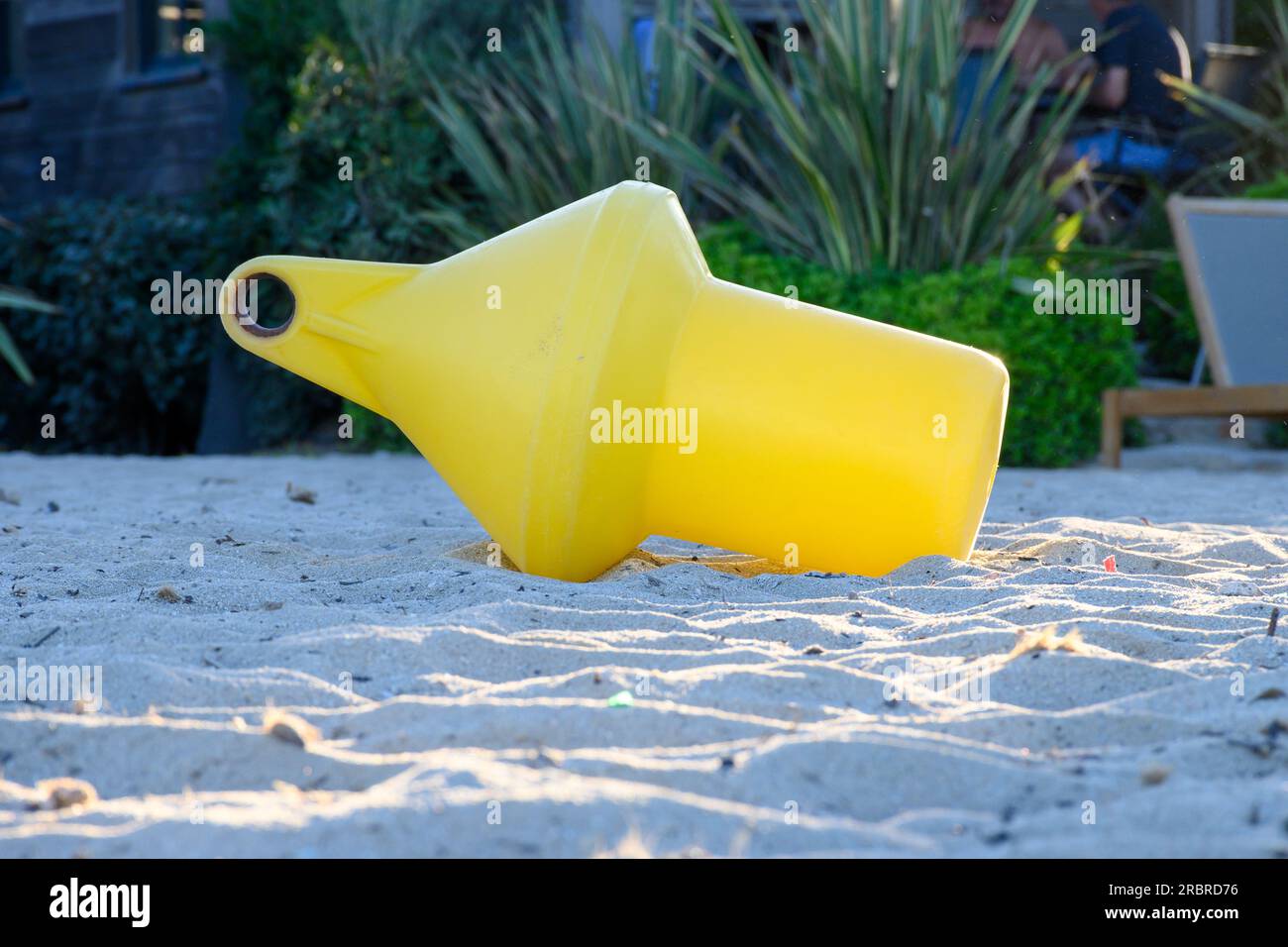 Yellow sea buoy on sandy beach on Gulf of Saint-Tropez, summer vacation ...