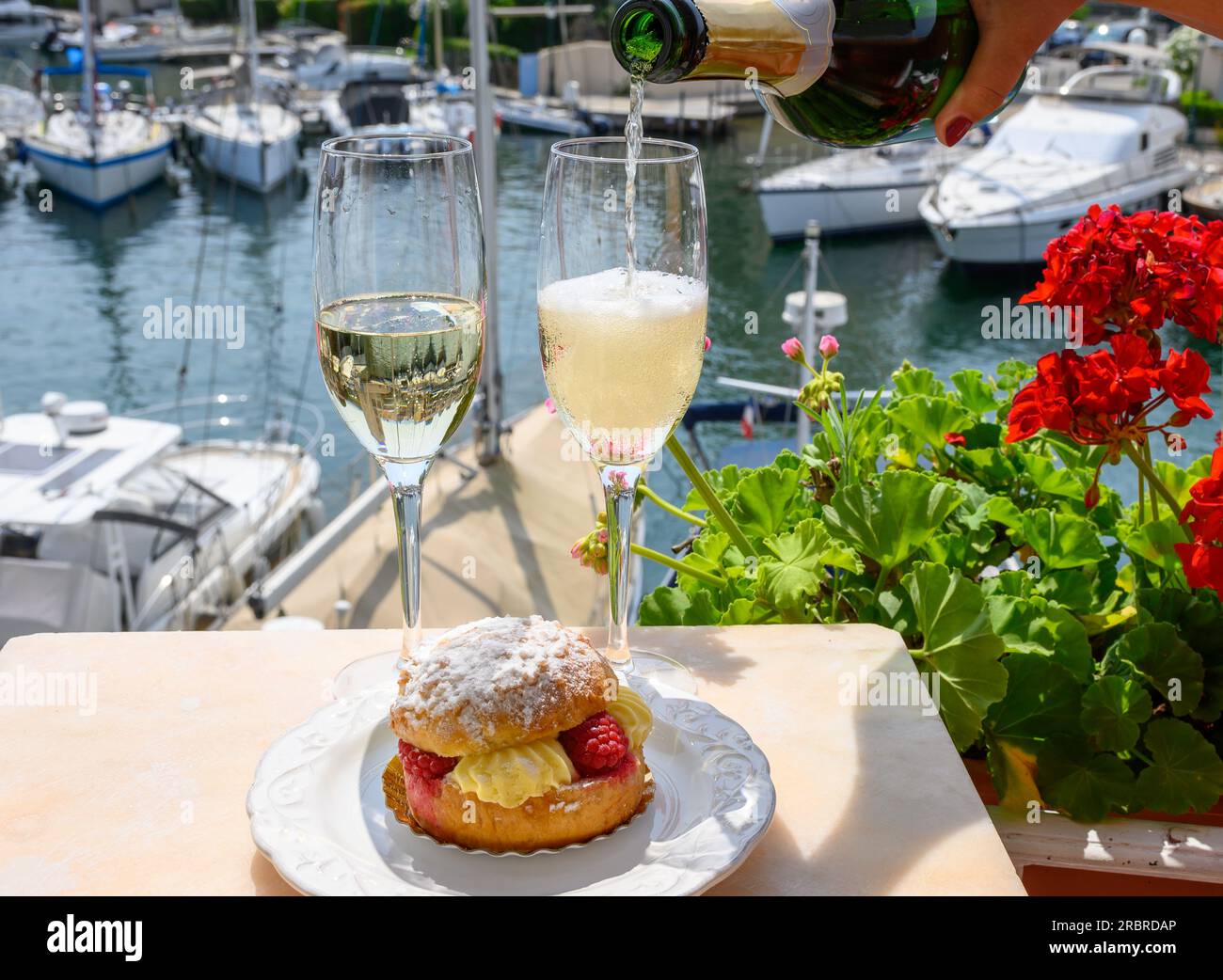 Drinking of French brut champagne sparkling wine with cake Tarte ...
