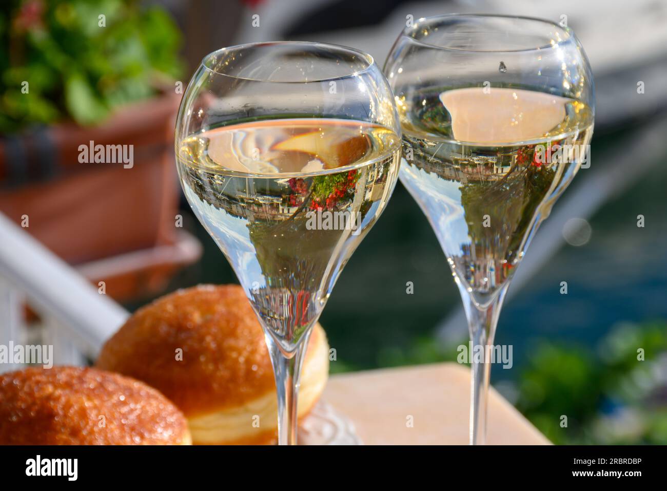 Drinking of French brut champagne sparkling wine with sweet apple ...