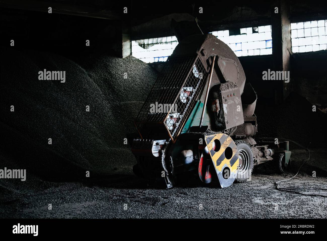 Fuel pellet belt loading machine Stock Photo - Alamy