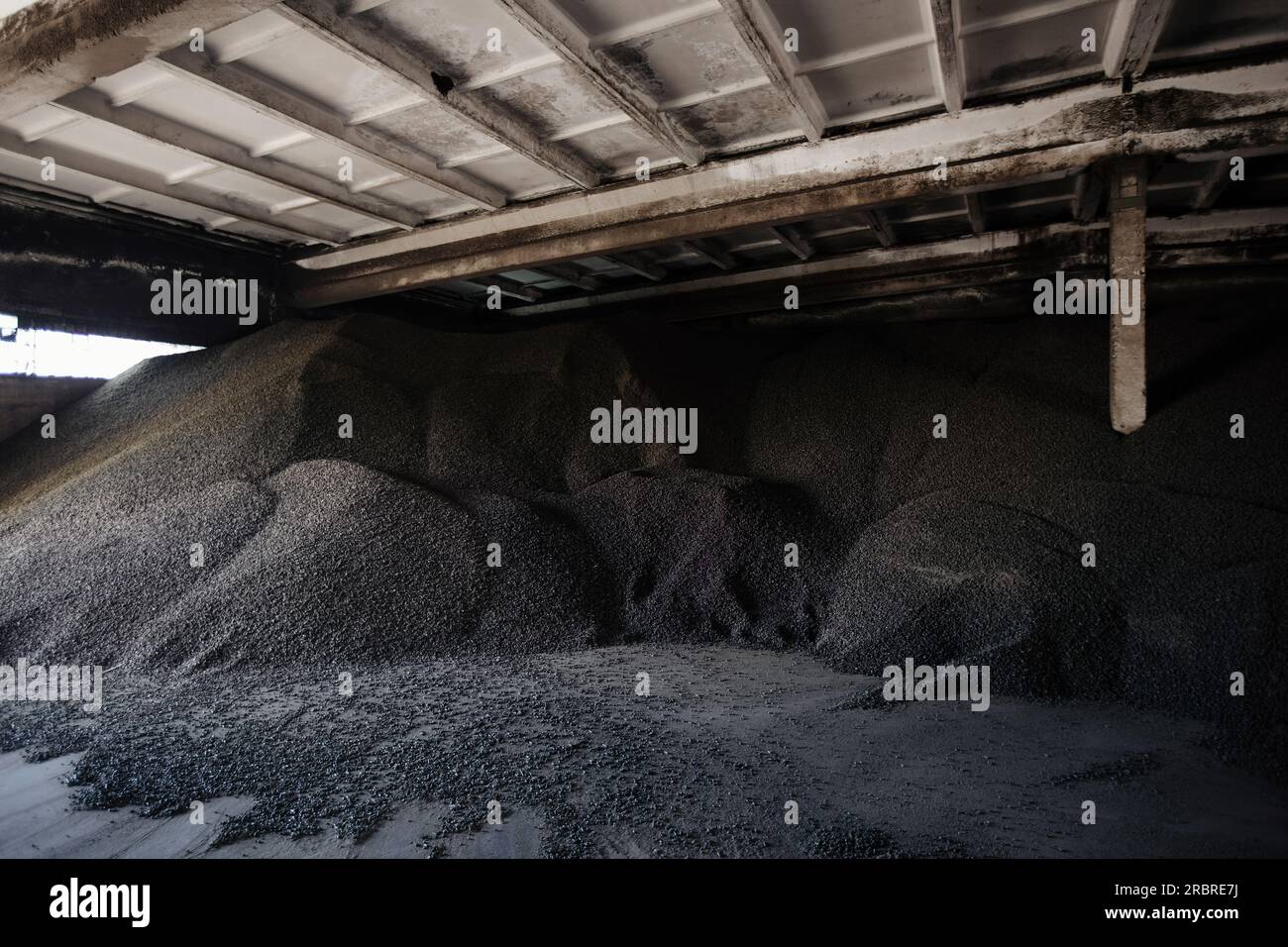Black bio fuel pellets in warehouse Stock Photo - Alamy