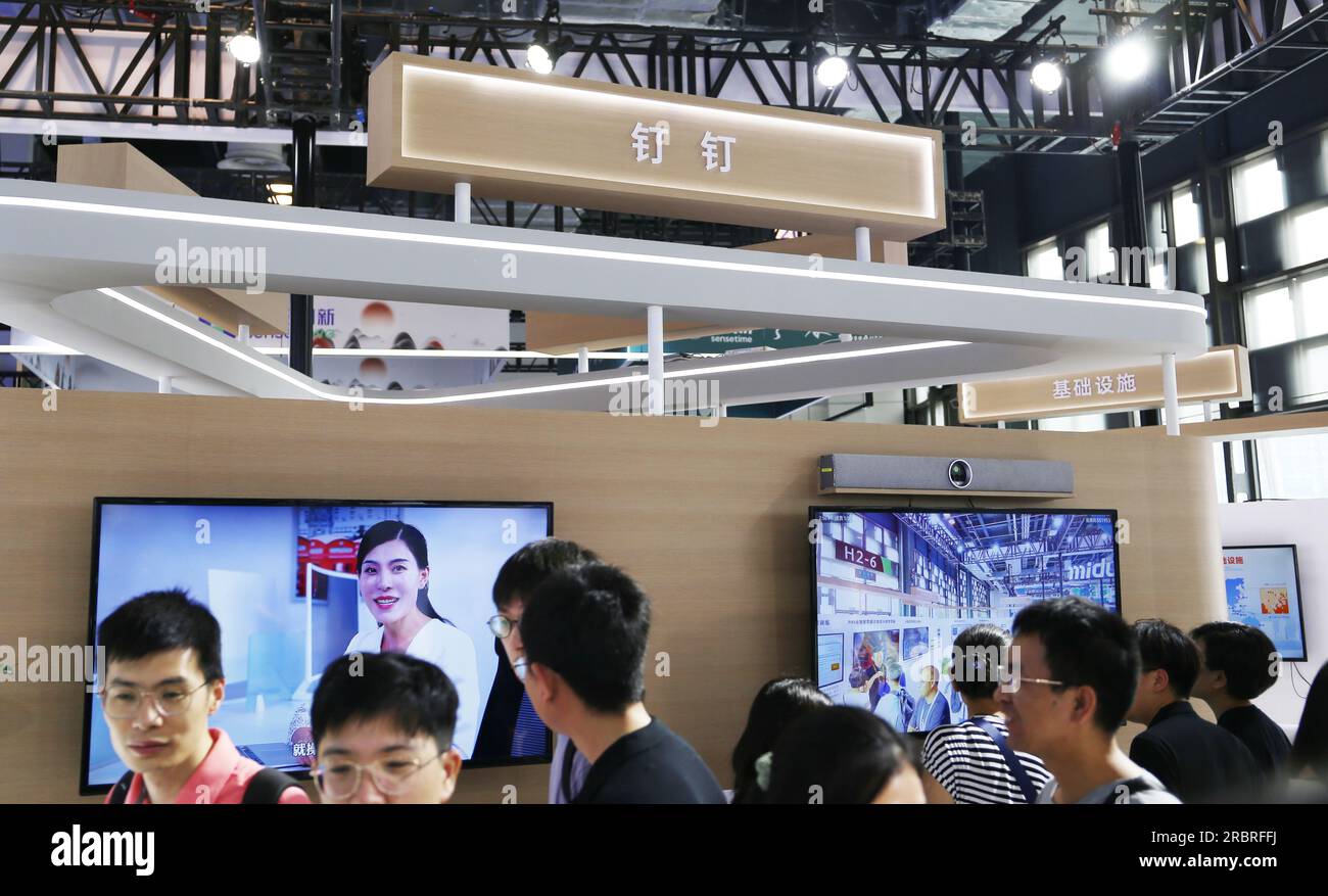SHANGHAI, CHINA - JULY 8, 2023 - Visitors visit Dingding booth at the ...