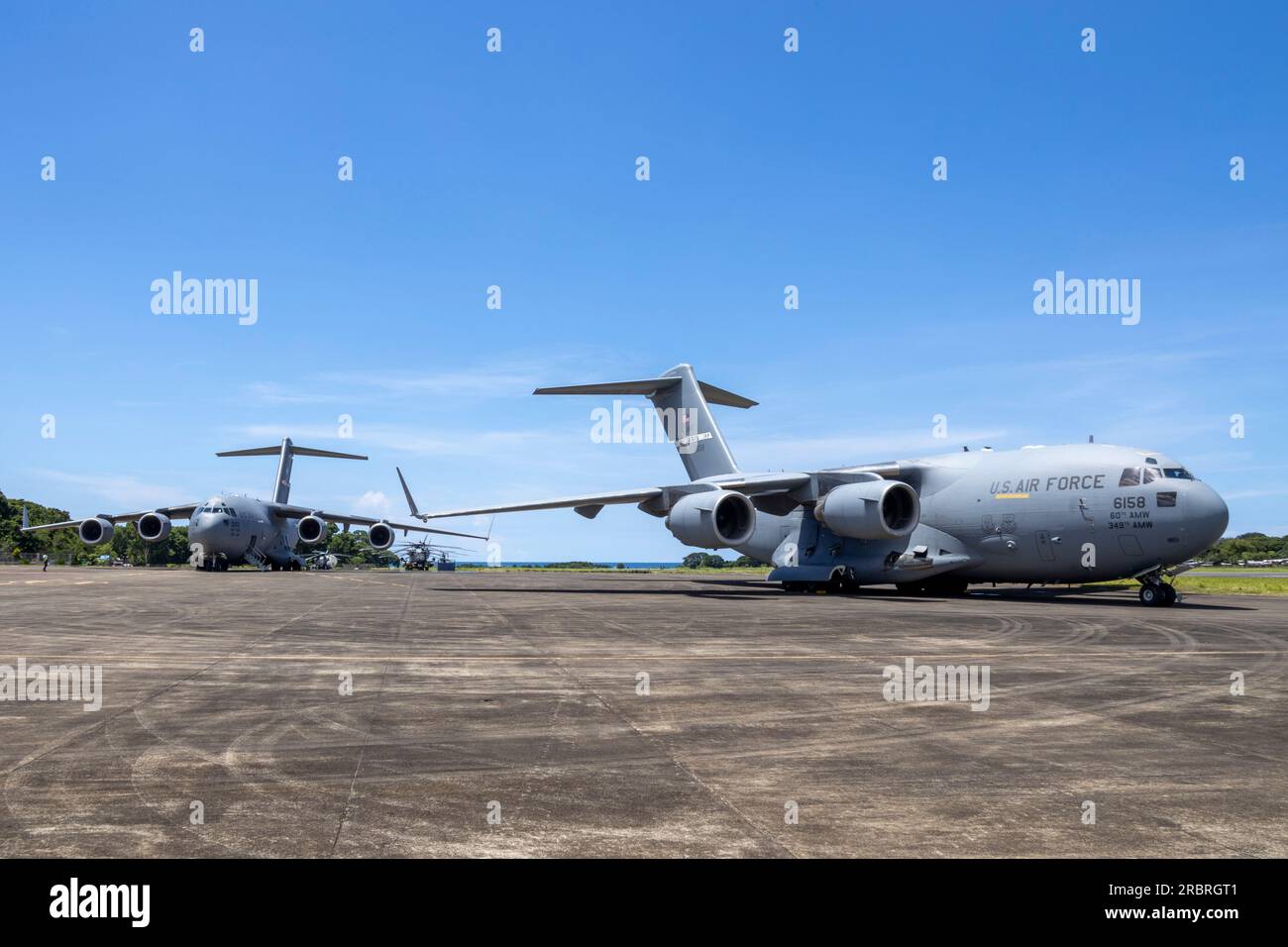 Two U.S. Air Force C-17 Globemasters park on the runway at Antonio ...