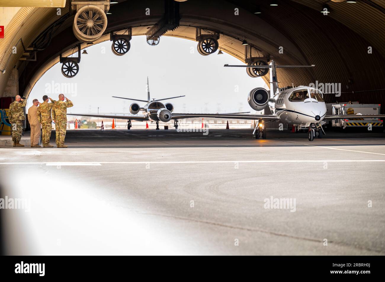 Leadership from the 379th Expeditionary Operations Group render a ...