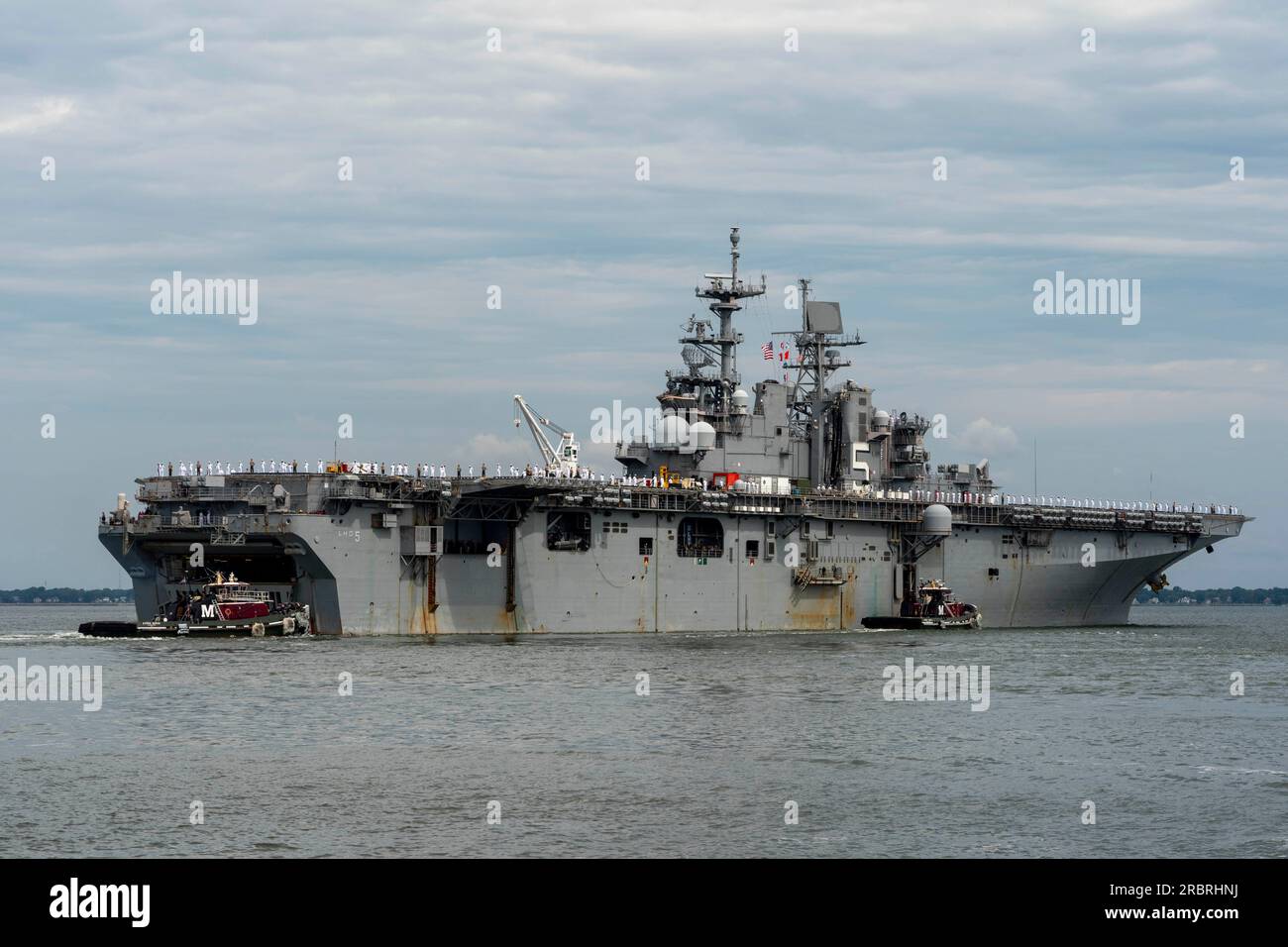 NORFOLK, Va. - The amphibious assault ship USS Bataan (LHD 5) departs ...