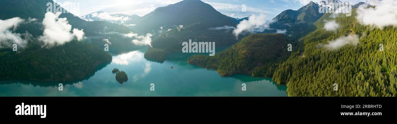 Rugged, forest-covered landscape surrounds Diablo Lake in North ...