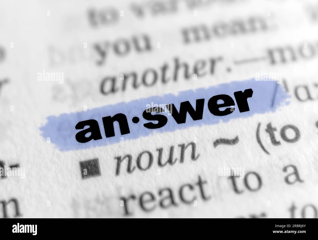 The word answer from a dictionary. Blue markerd Stock Photo - Alamy