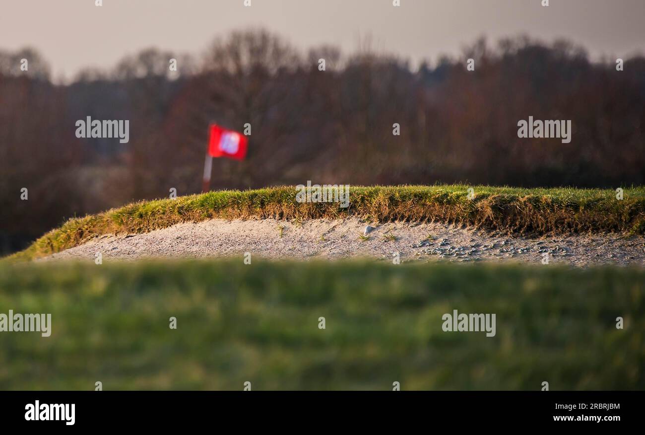 Sand trap in front of pin Stock Photo - Alamy