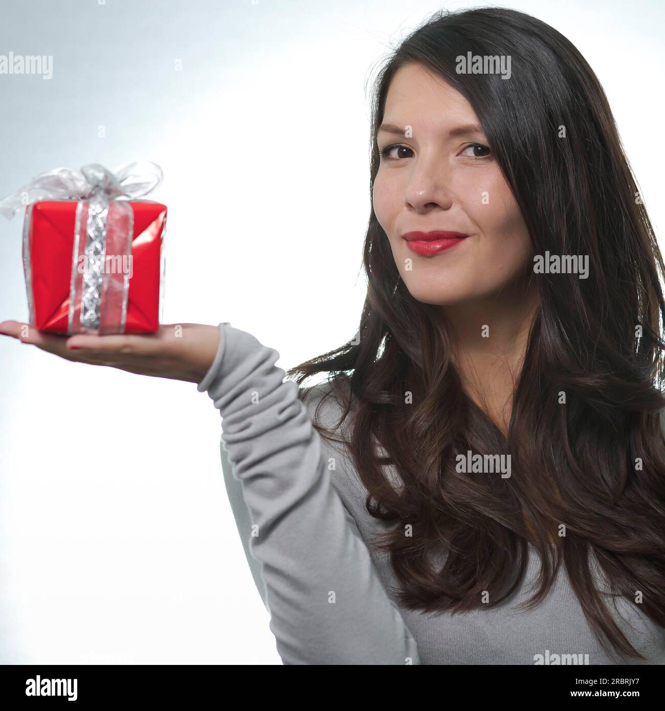 Presenting a gift hi-res stock photography and images - Alamy