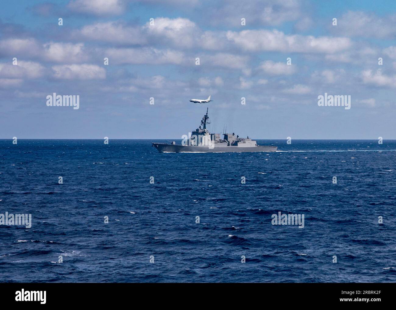 230619-N-CD453-1174 EAST CHINA SEA (June 18, 2023) A P-8 aircraft flies ...