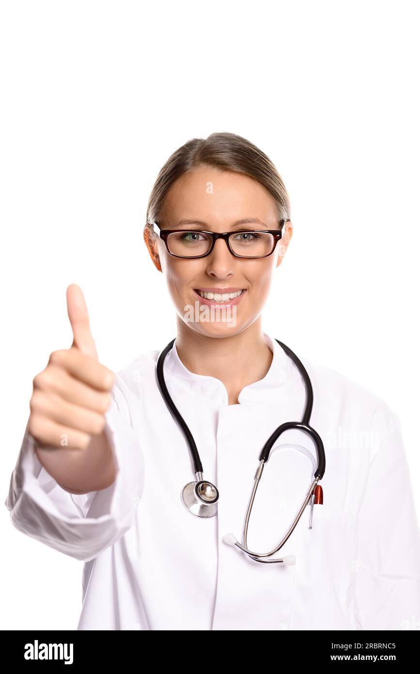Happy woman doctor giving a thumbs up gesture to show that surgery or ...