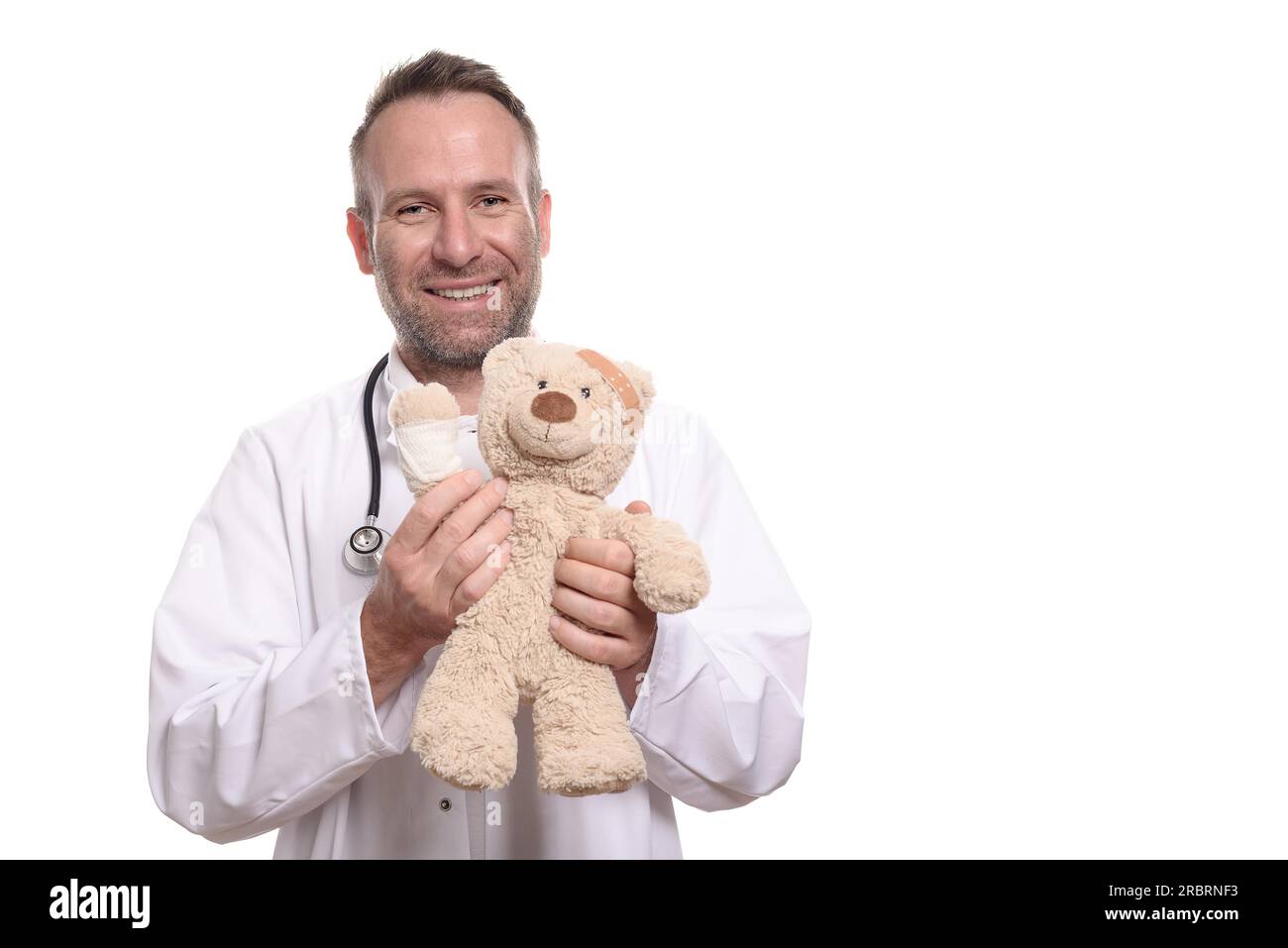 Friendly smiling middle-aged male paediatrician with unshaven stubble ...