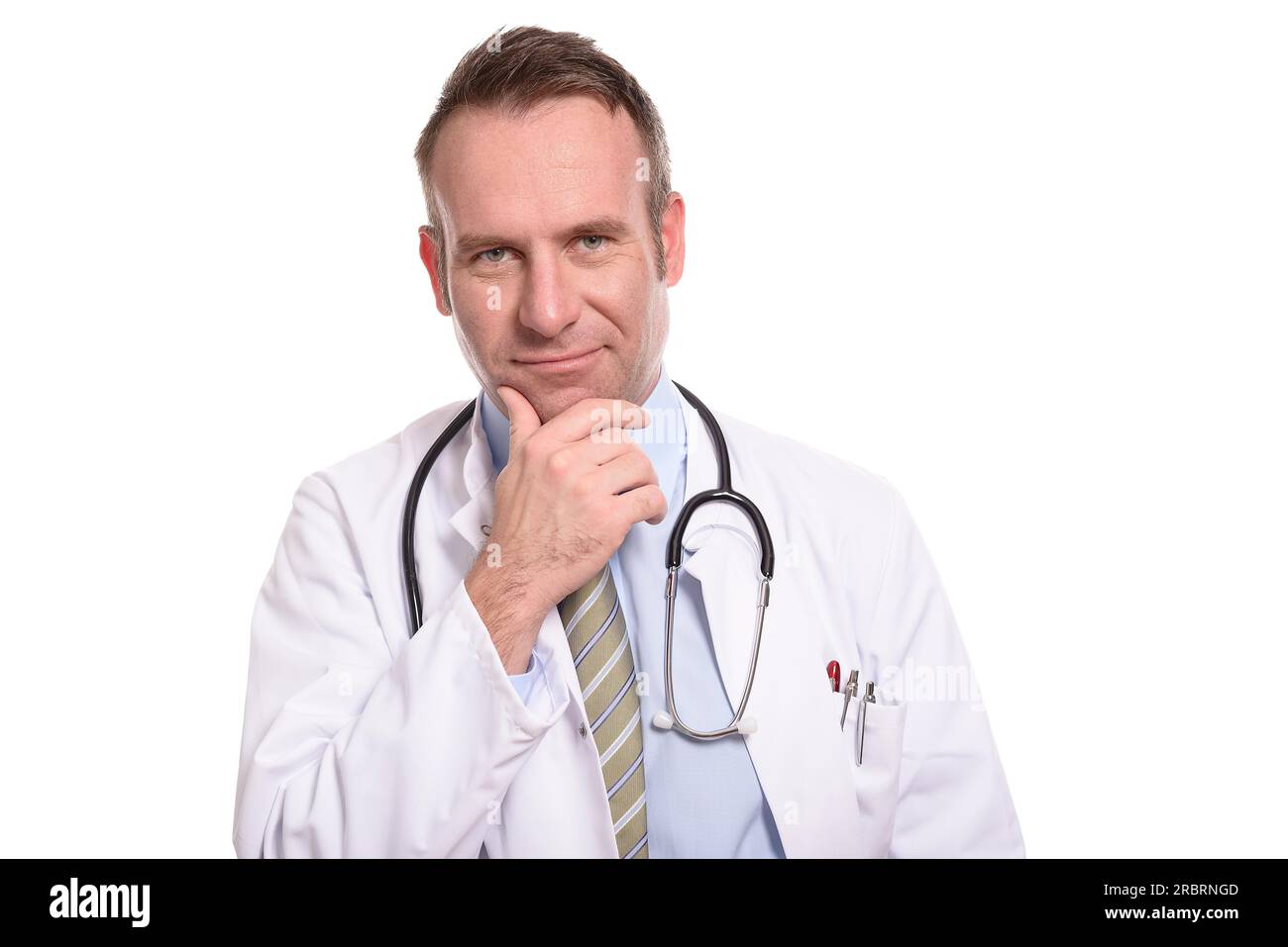 Thoughtful middle-aged male doctor in a white lab coat and stethoscope ...