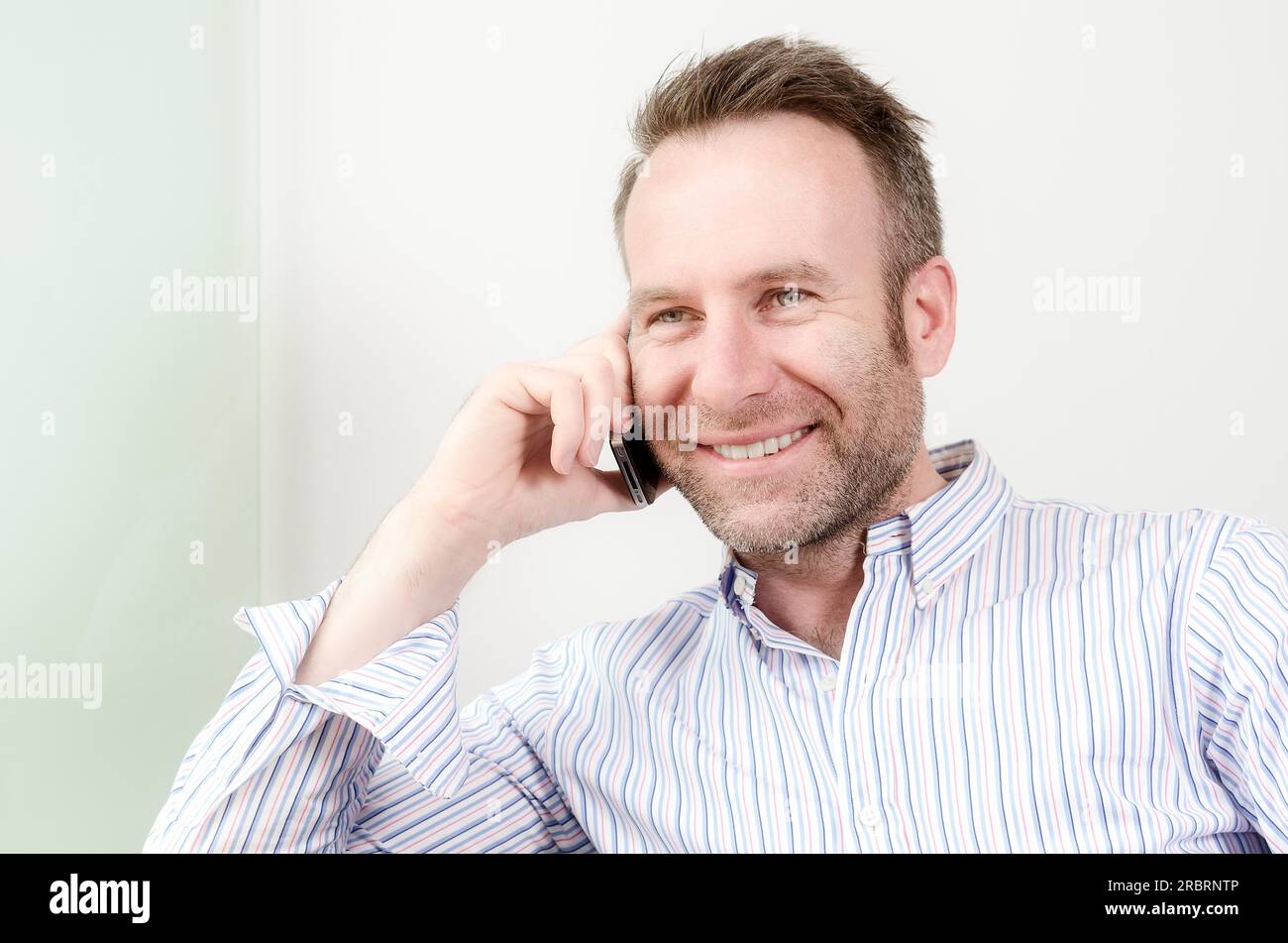Horizontal portrait of a Caucasian middle-aged handsome man wearing a ...