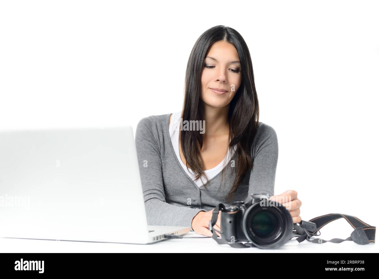 Young Attractive Woman Connecting DSLR Camera to Laptop computer To ...