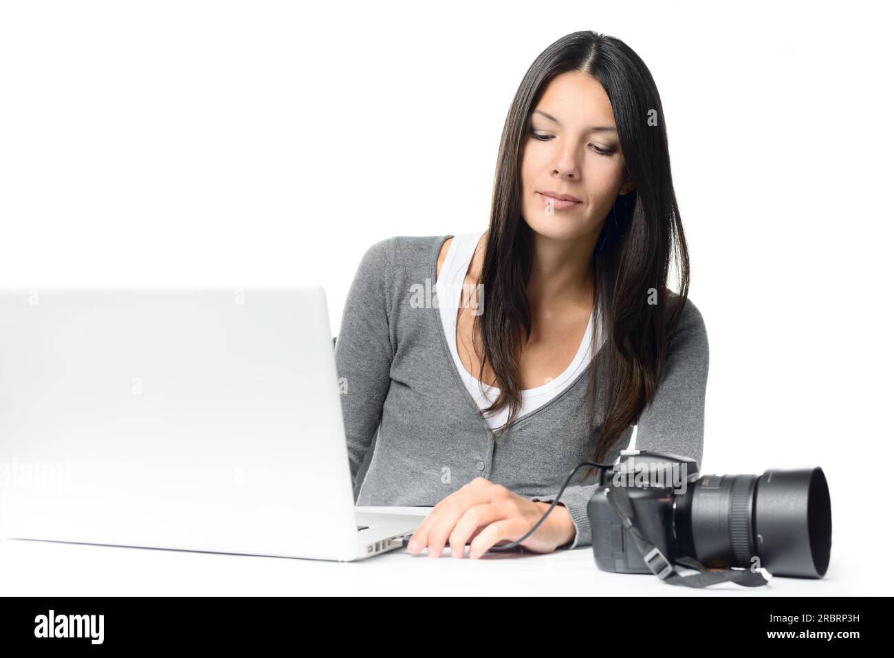 Young Attractive Woman Connecting DSLR Camera to Laptop computer To ...