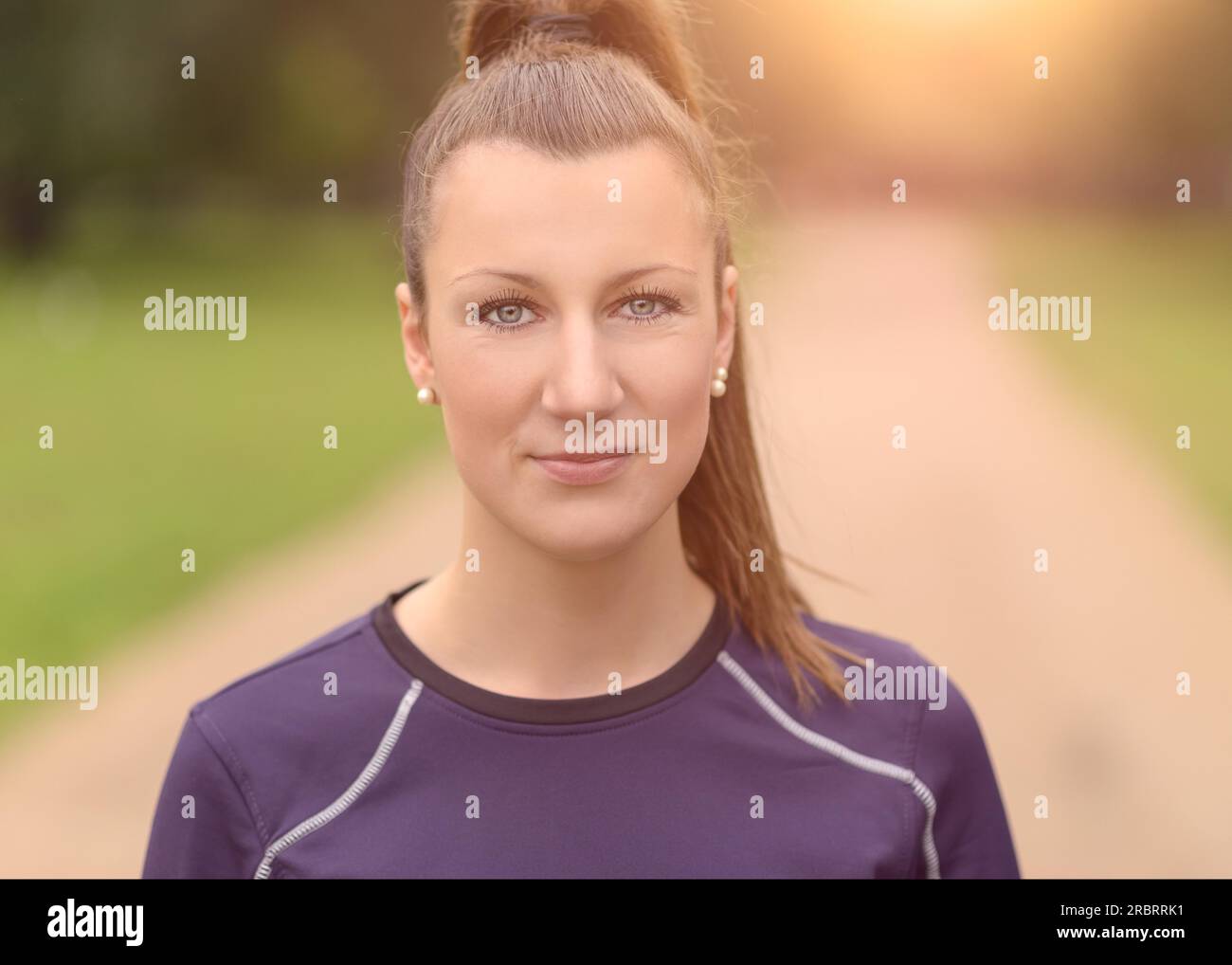 Close up Head and Shoulder Shot of a Fit Young Woman Looking at the ...