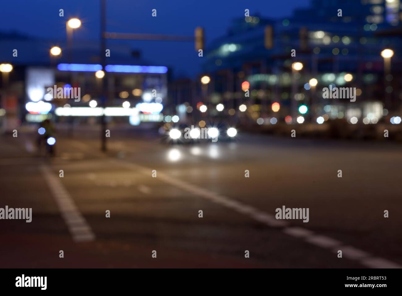 Obscured focus of city street from first person view of pedestrian on ...