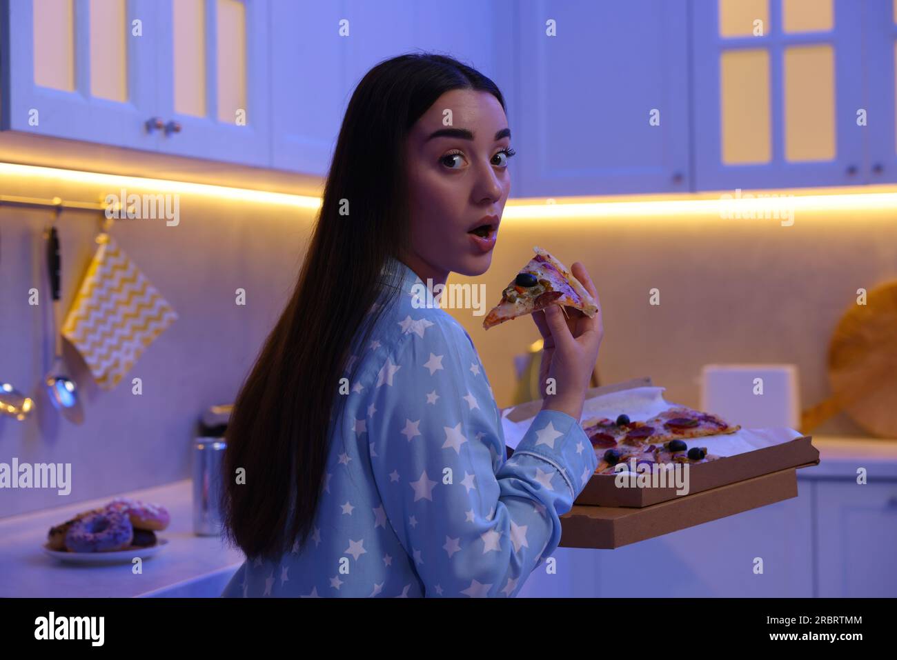 Alone woman pizza night hi-res stock photography and images - Alamy