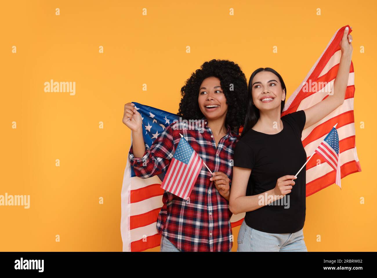 4th of July - Independence Day of USA. Happy women with American flags ...