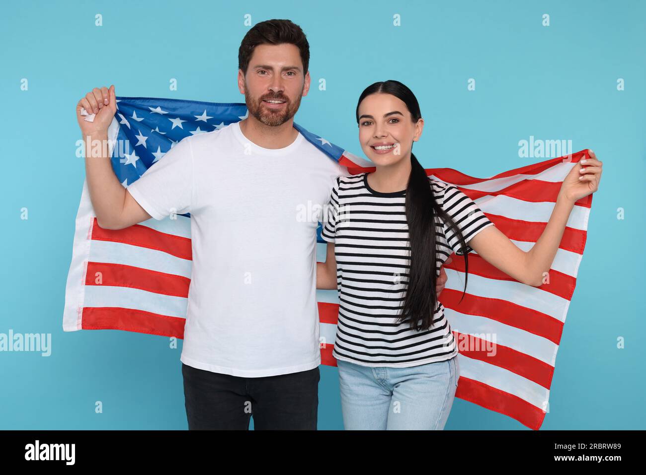 4th of July - Independence Day of USA. Happy couple with American flag ...