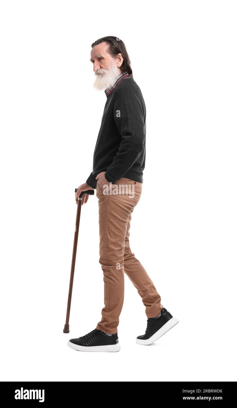 Senior man with walking cane on white background Stock Photo - Alamy