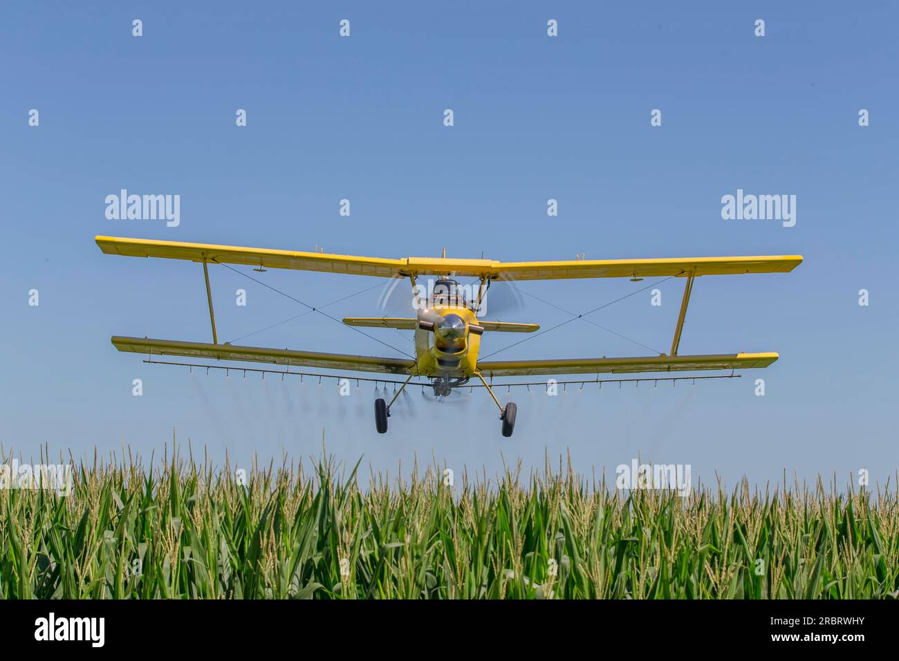 Crop duster applies chemicals field hi-res stock photography and images ...
