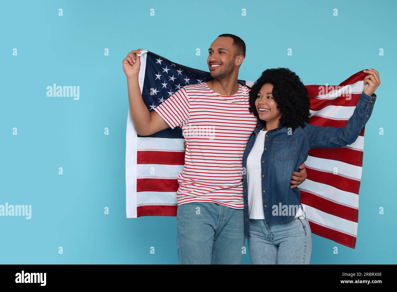 4th of July - Independence Day of USA. Happy couple with American flag ...