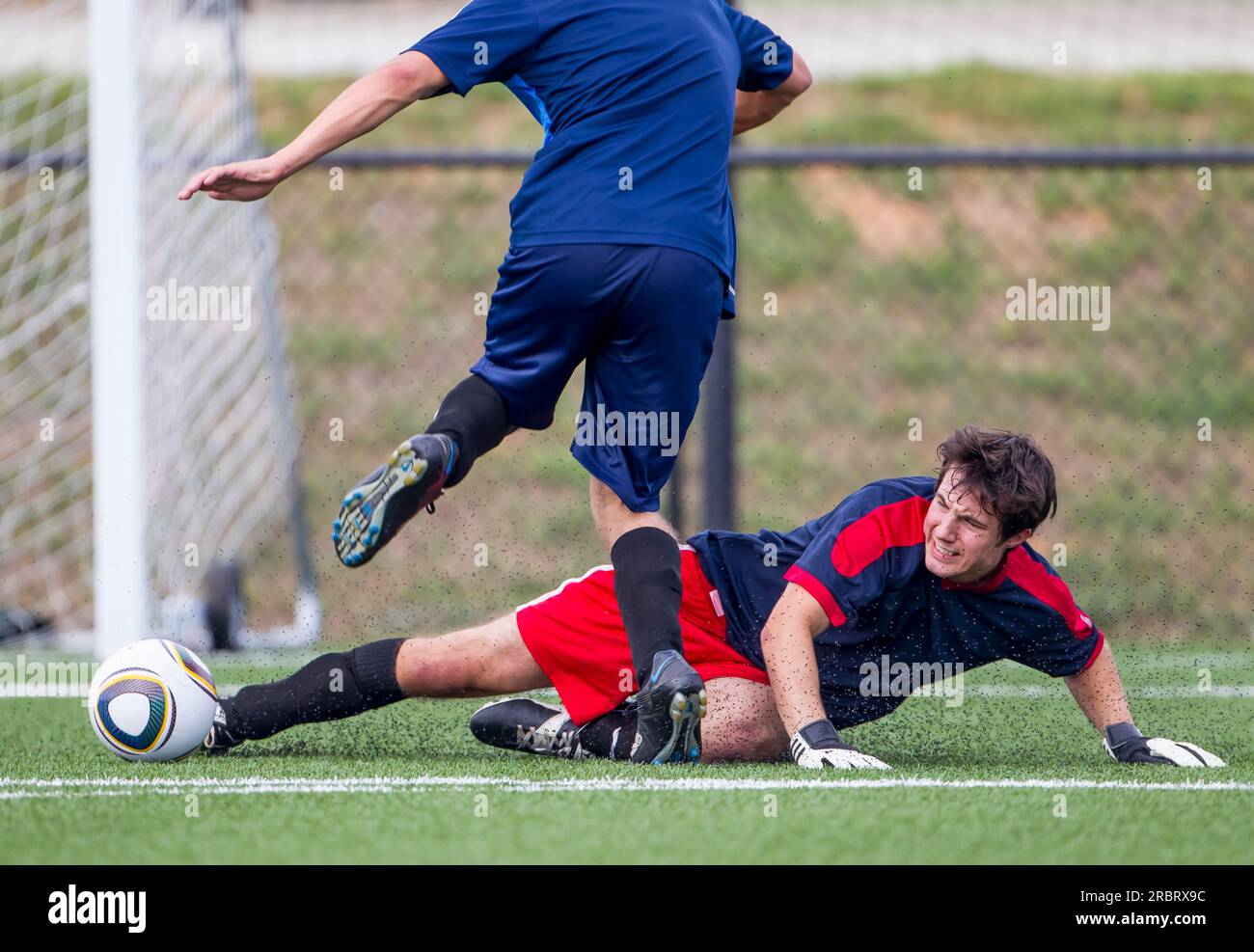 Action man football hi-res stock photography and images - Alamy