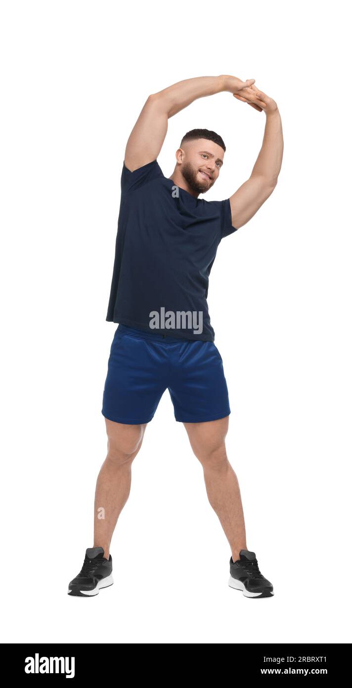 Athletic yoga doing stretching Cut Out Stock Images & Pictures - Alamy