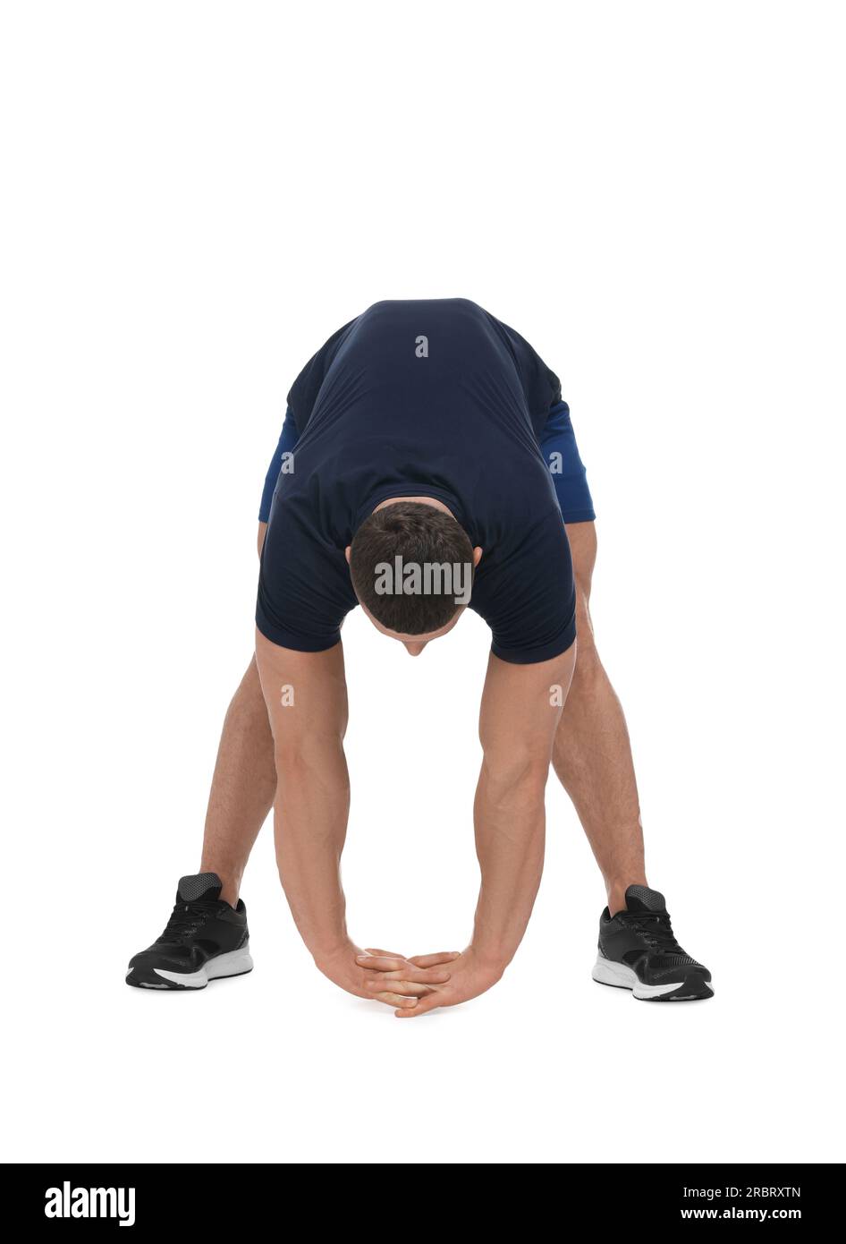 Man doing stretching on white background. Morning exercise Stock Photo ...