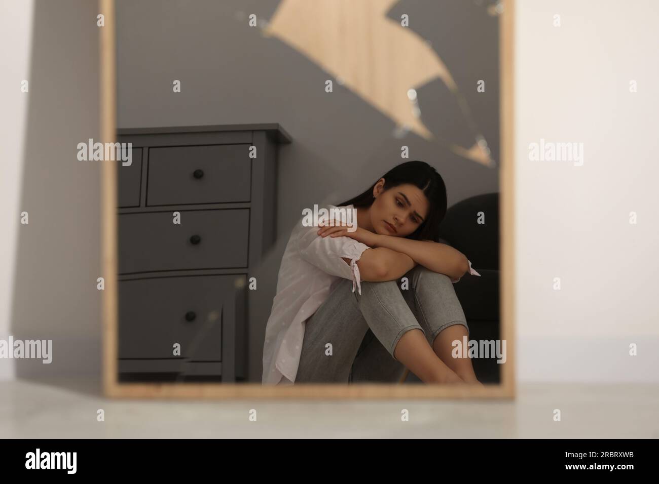 Mental problems. Depressed woman reflecting in broken mirror Stock ...